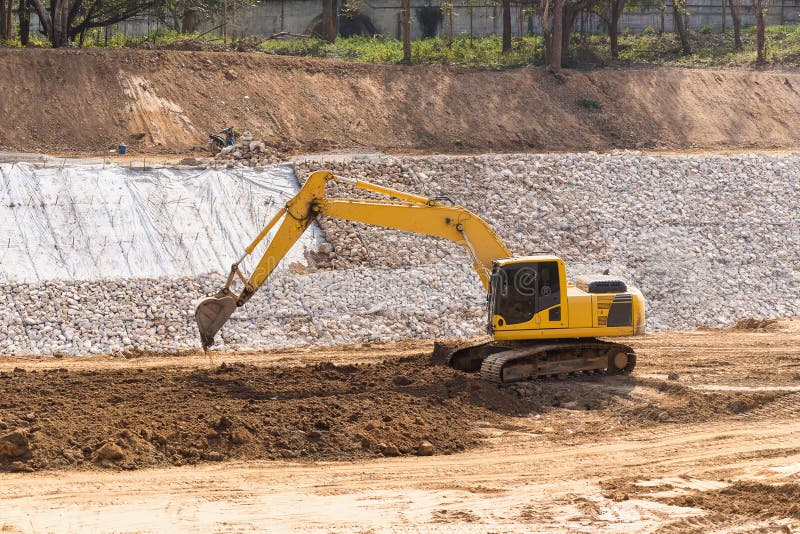 Yellow Backhoe Work in the Dam Stock Image - Image of loader, excavate ...