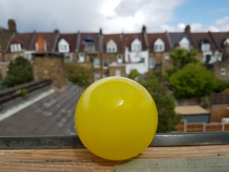 Yellow ball stock image. Image of house, yellow, city - 91332557