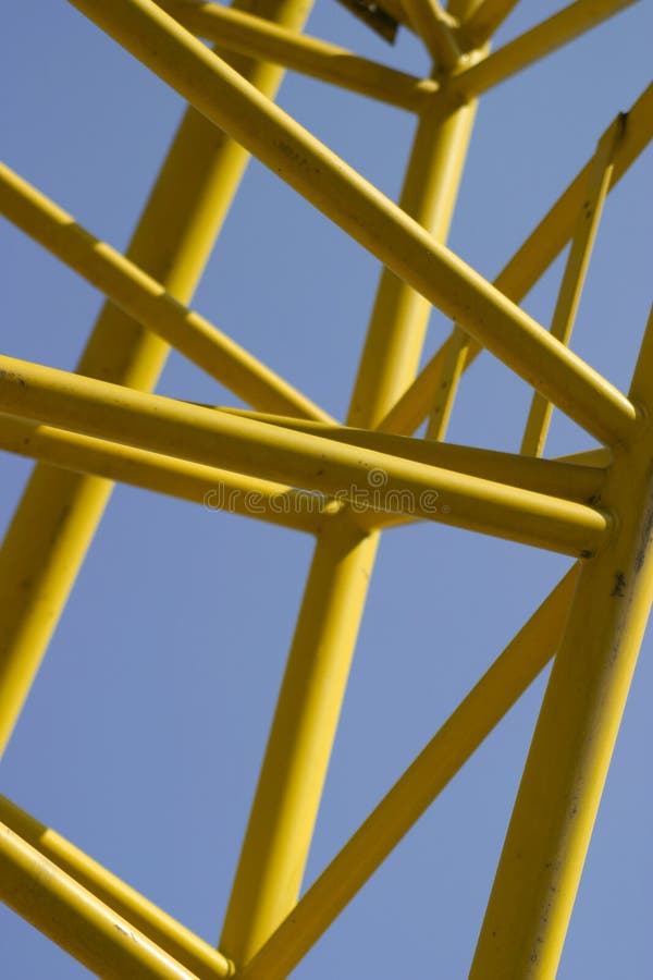 Yellow Bars Against Blue Sky Stock Photo - Image of form, tower: 12717748