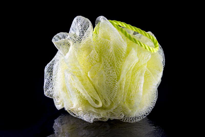 Yellow Bath Sponge on Black Stock Photo - Image of massage, body: 37633946