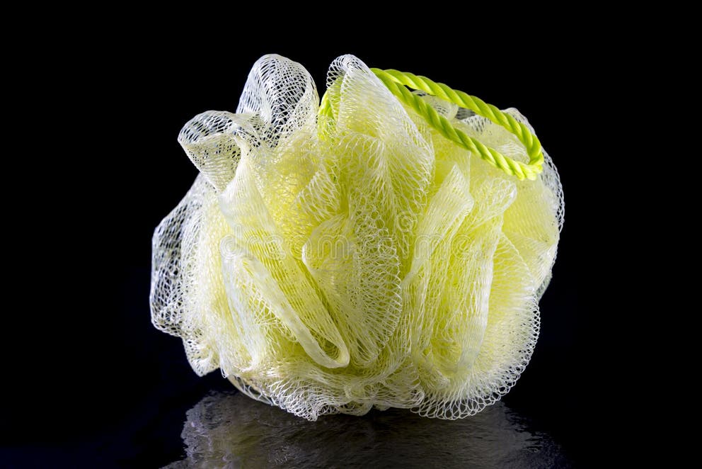 Yellow Bath Sponge on Black Stock Photo - Image of massage, body: 37633946