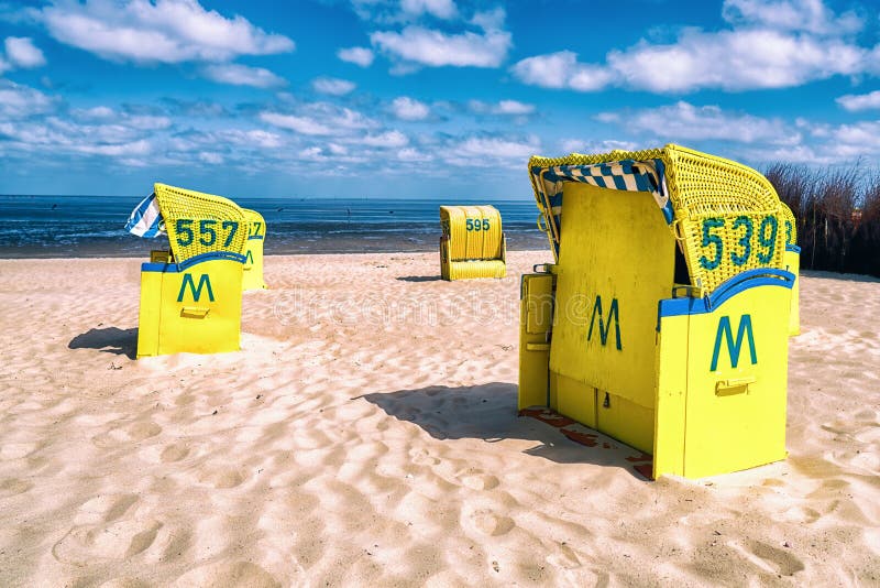 Yellow Beach Chairs by the Sea Stand in the Sand in the Midday Sun ...