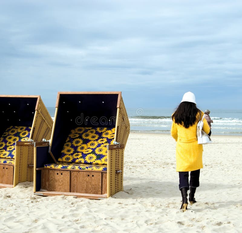 Yellow beach walk. stock image. Image of beach, grey, overcast - 2345289