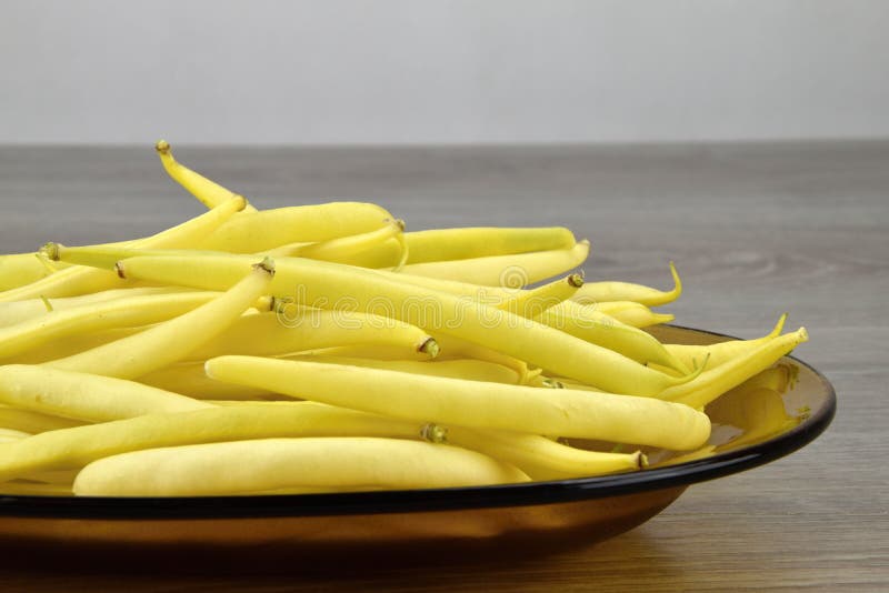 Yellow Bean Pods on the Glass Plate, Detail Stock Photo - Image of ...