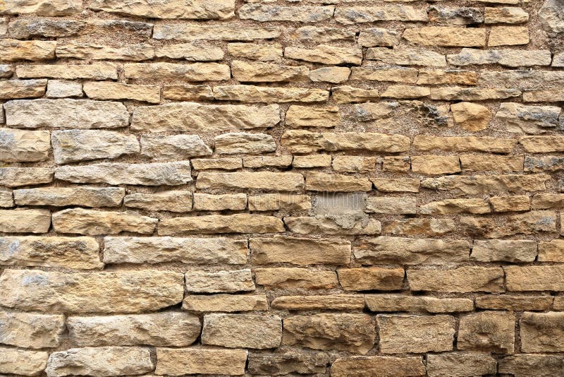 Yellow Beige Sand Color Stone Brick Vertical Wall Stock Image - Image ...
