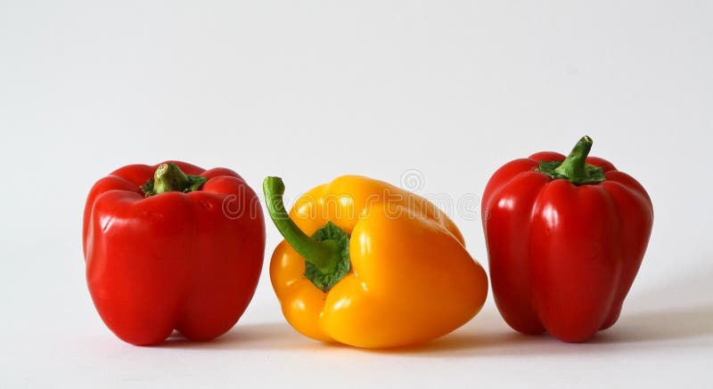 Yellow Bell Pepper Between 2 Red Bell Pepper Picture. Image: 83065197
