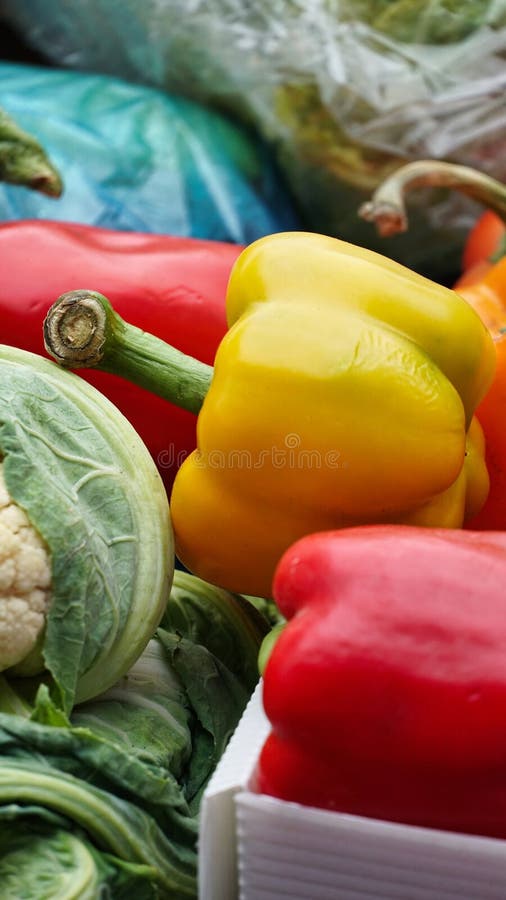 Yellow Bell Pepper and Red Bell Peppers on Display Stock Photo - Image ...