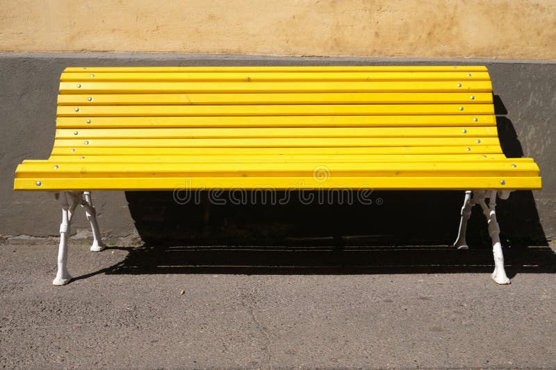 A yellow bench stock image. Image of outdoors, bench - 384654421