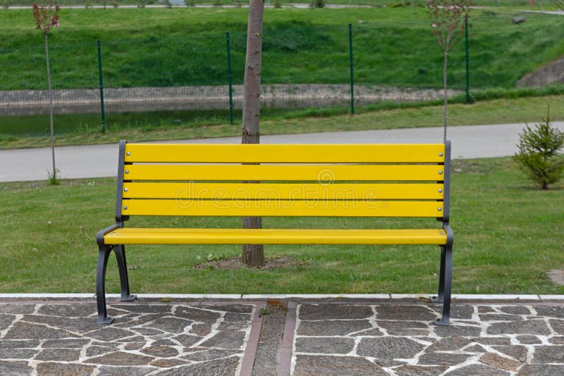 Yellow Bench stock photo. Image of pavement, yellow - 210831800