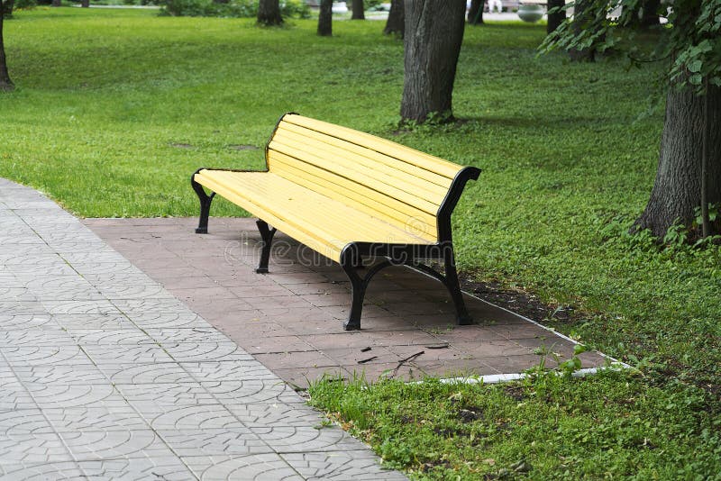 Yellow bench. stock photo. Image of summer, greenery - 84553390