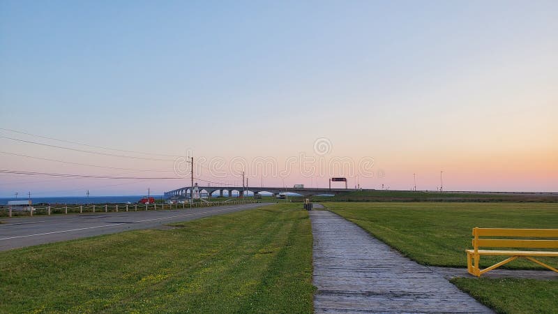 Yellow Bench on the Side of a Road Stock Photo - Image of road, nature ...
