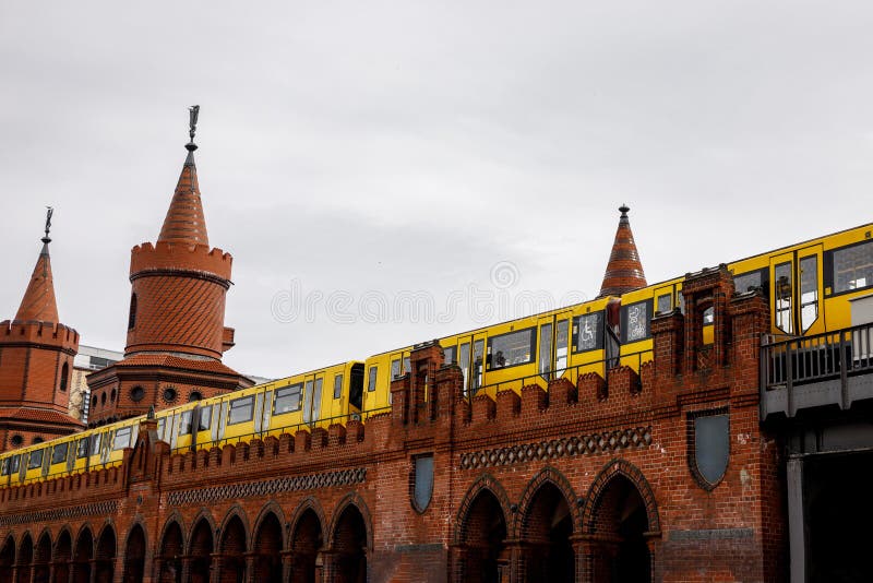 Yellow Berlin Metro Train on the Historic Oberbaum Bridge Stock Image ...