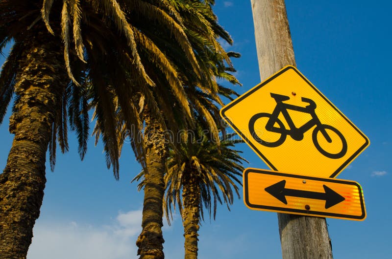 Yellow Bicycle Path Sign with an Arrow in a Park. Stock Image - Image ...