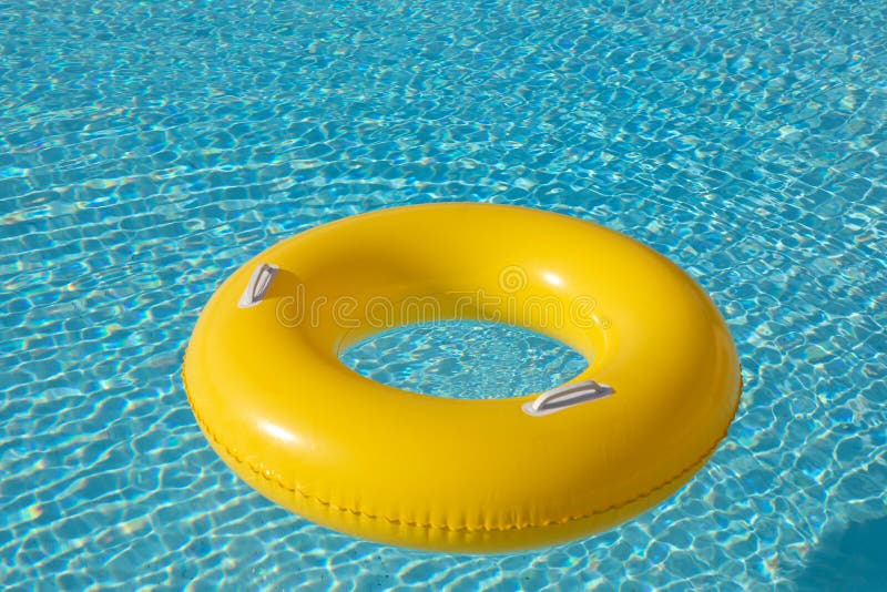 Yellow big float on pool stock photo. Image of resort - 182010632