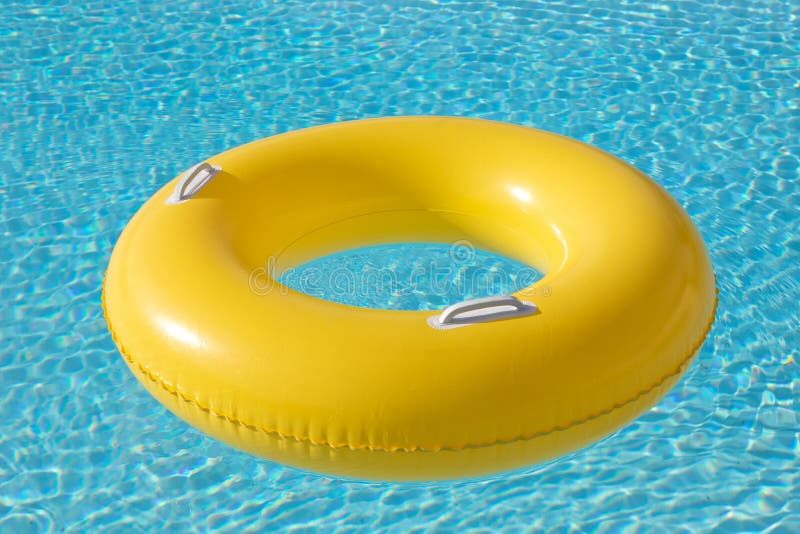 Yellow big float on pool stock image. Image of float - 182010637