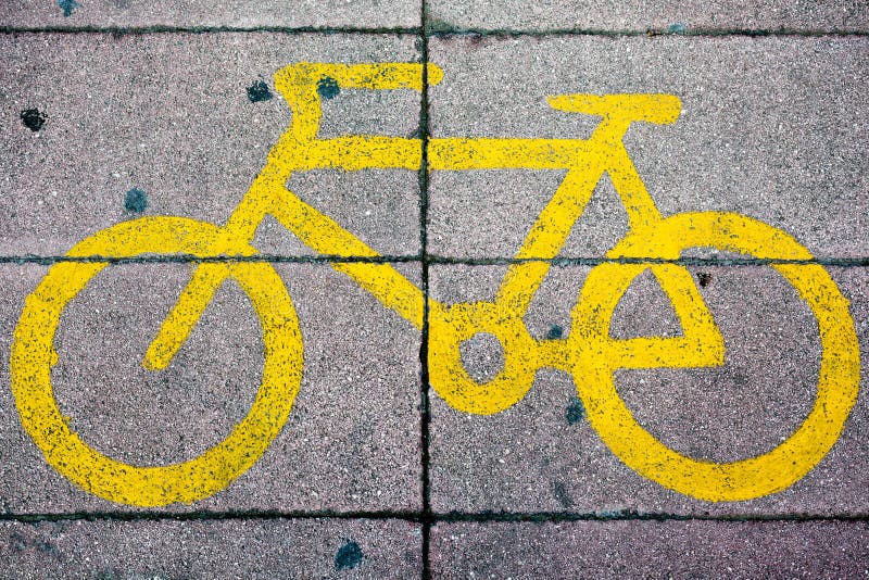 Yellow Bike Lane Sign stock photo. Image of close, path - 23841376