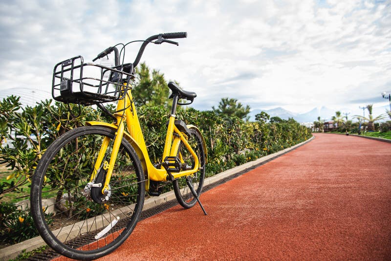 Yellow Bike Network Rental Stands on the Red Bike Path Stock Photo ...