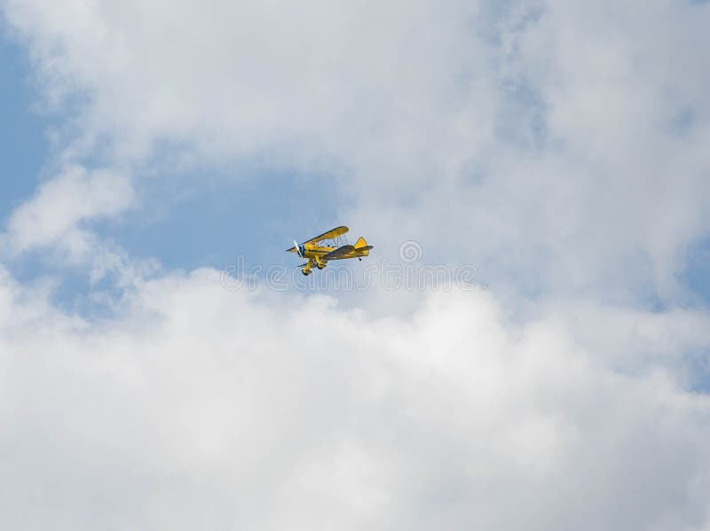Yellow Biplane in flight stock photo. Image of plane - 50239506