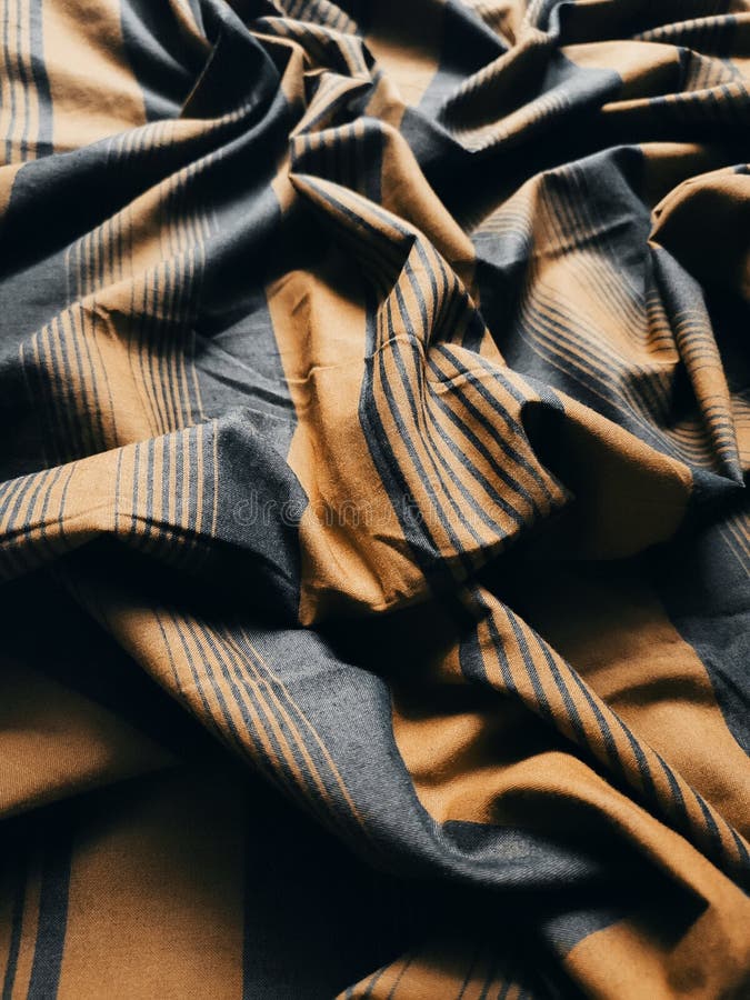 The Yellow, Black and Eye-catching Checkered Cover Features a Classic Pattern that Exudes ...