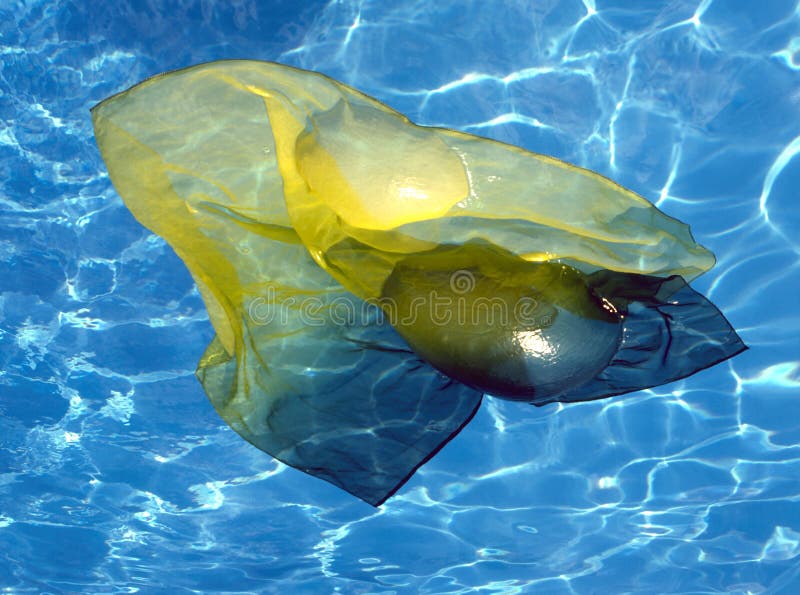 Red Fabric Floating in Pool Stock Image - Image of lookup, rainy: 112519861