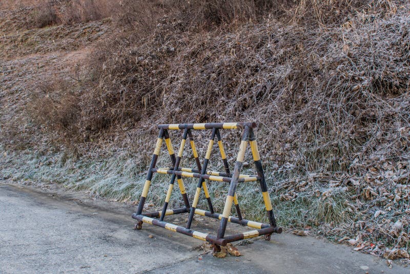 Yellow and black road gate stock photo. Image of road - 166234600