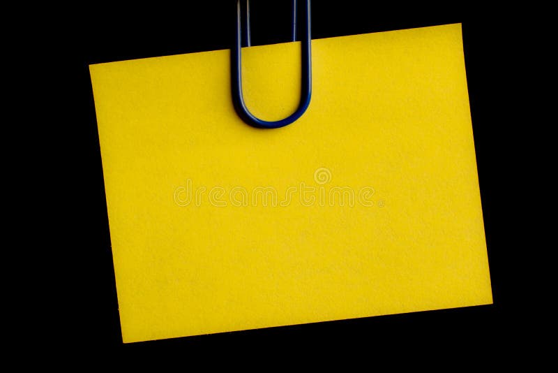 Yellow Blank Note Pinned To a Black Notice Board with a Paper Clip ...