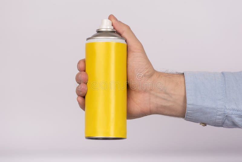 Yellow Blank Spray Can in Mans Hand. Design Template of Sprayer Can for ...