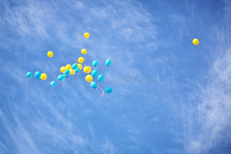 Yellow and Blue Balloons in the Sky Stock Photo - Image of balloon ...