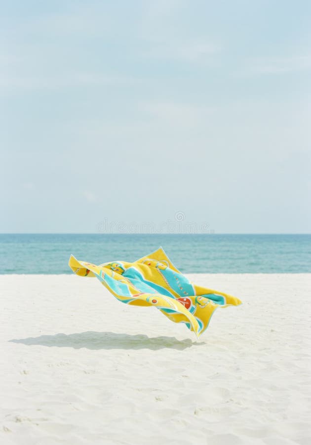Yellow and Blue Beach Blanket in the Wind Stock Illustration ...