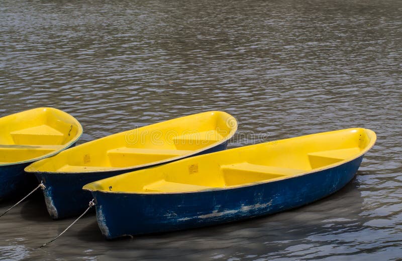Yellow-Blue Boat stock image. Image of vessel, ocean - 52151565