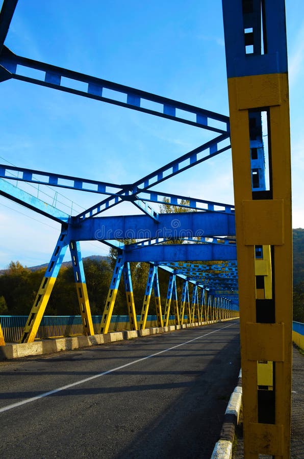 Yellow and Blue Bridge with Clear Blue Sky Stock Photo - Image of ...