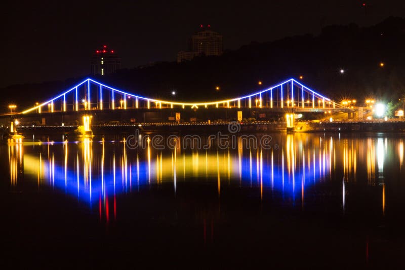 Yellow-blue Cities. Bright Green Bridge Over the River Stock Photo ...