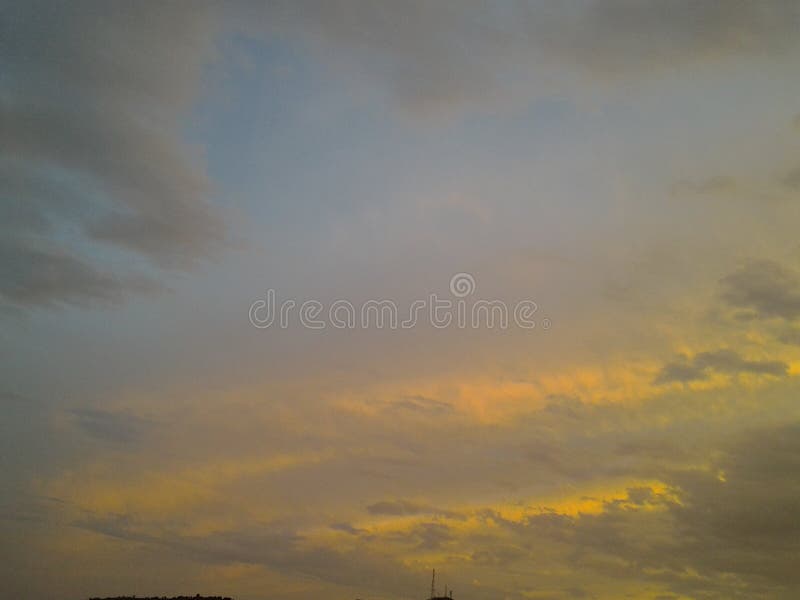 Yellow Blue Clouds Sky Sunset Stock Photo - Image of cloudy, yellow ...
