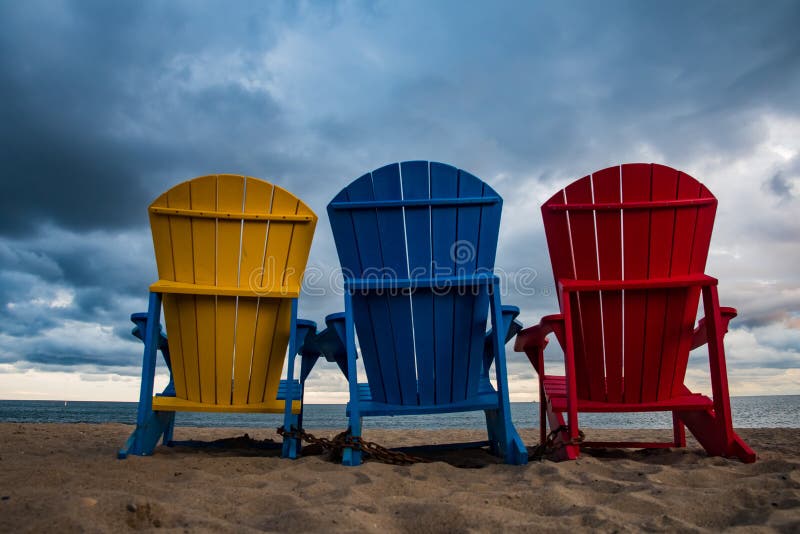Yellow Blue Green Chairs on a Beach Stock Image - Image of green, blue ...