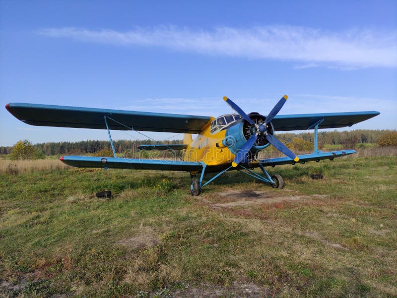 Yellow and Blue Old Biplane Plane with a Single Piston Engine and ...