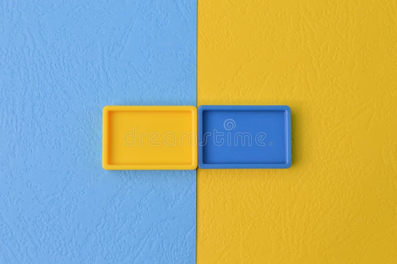 Yellow and Blue Plastic Toy Building Blocks. Game for Development Stock ...
