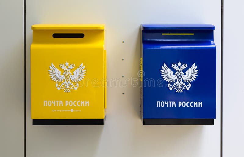 Yellow and Blue Post Boxes on the Wall Next To Post Office Editorial ...