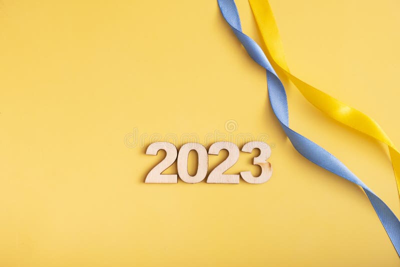 Yellow and Blue Ribbon with Numbers 2023 on Yellow Background. Stock ...