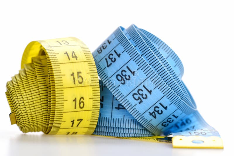 Yellow and Blue Rolled Measuring Tapes on White Background. Stock Image ...
