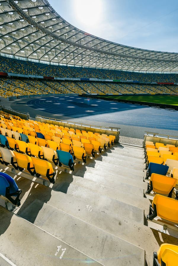 Yellow and Blue Stadium Seats on Olympic Stadium Stock Image - Image of ...