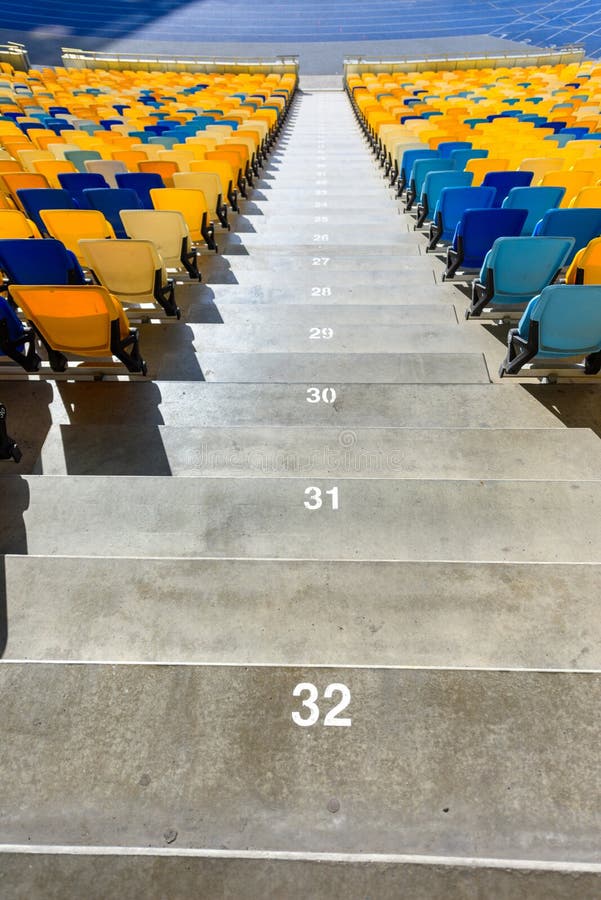Yellow and Blue Stadium Seats and Stadium Stairs Stock Photo - Image of ...
