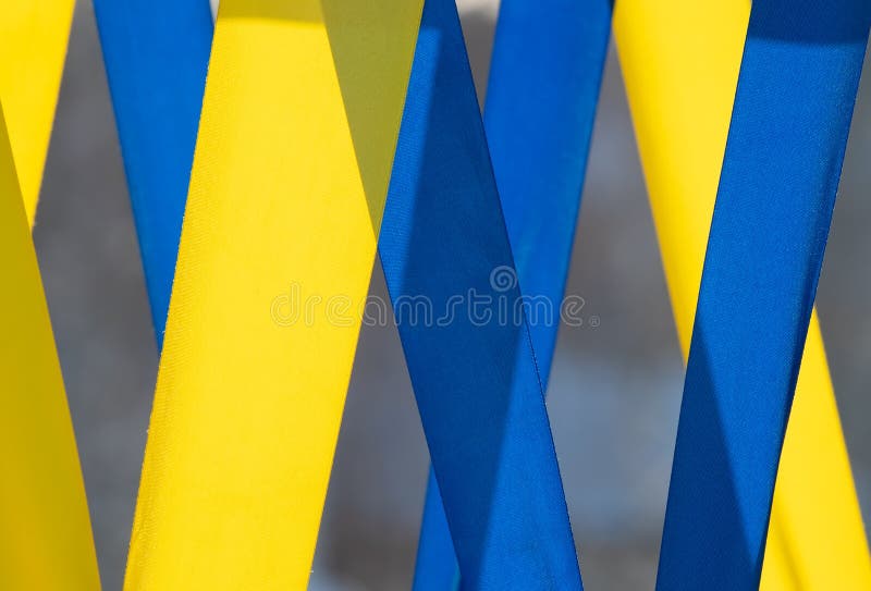 Yellow and Blue Vertical Ribbons Close-up Illuminated by the Sun Stock ...