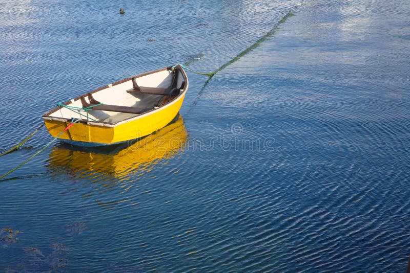 Yellow Boat Surface Reflection Stock Image - Image of surface, color ...