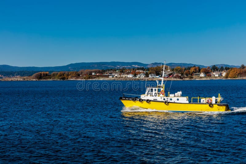 A Yellow Boat is Sailing on the Water Stock Image - Image of yellow ...