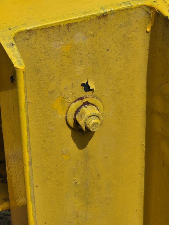 Yellow Bolts in a Metal Structure Stock Photo - Image of connectors ...