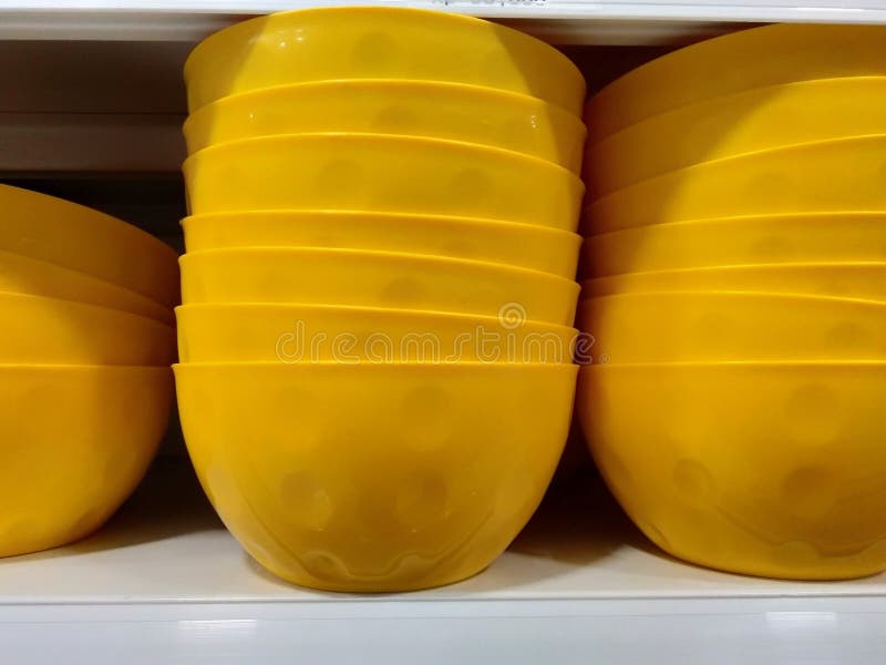 Yellow Bowls Display on the Shelf Stock Image - Image of collection ...
