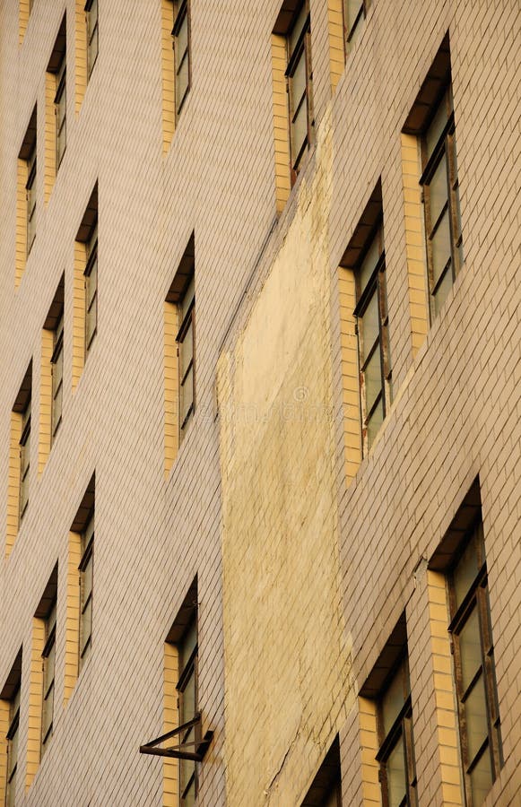Yellow Brick Building Facade Stock Photo - Image of windows, building ...