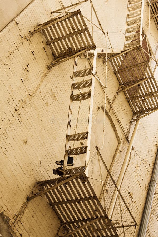 Yellow Brick and Fire Escape Stock Photo - Image of fire, metal: 28685496
