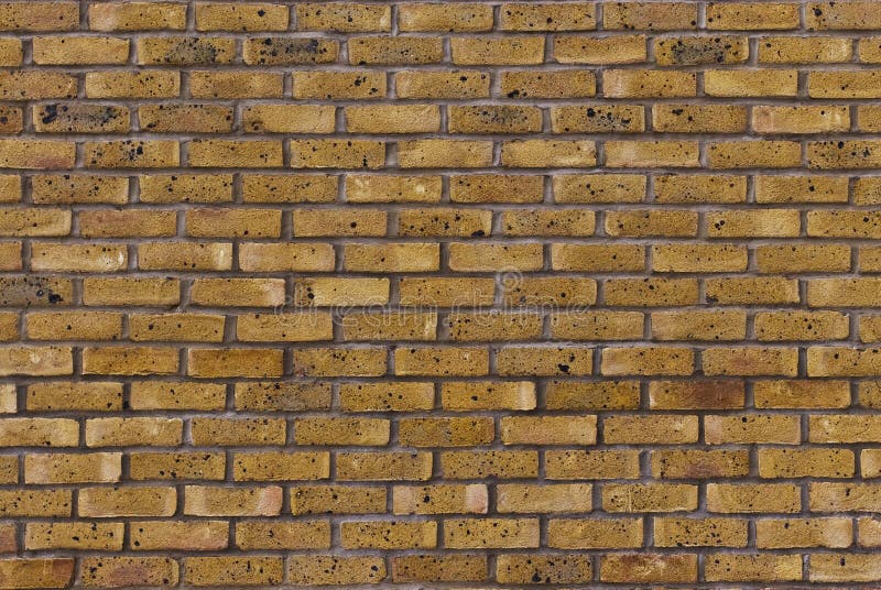 Yellow brick wall stock photo. Image of work, detail - 10997470