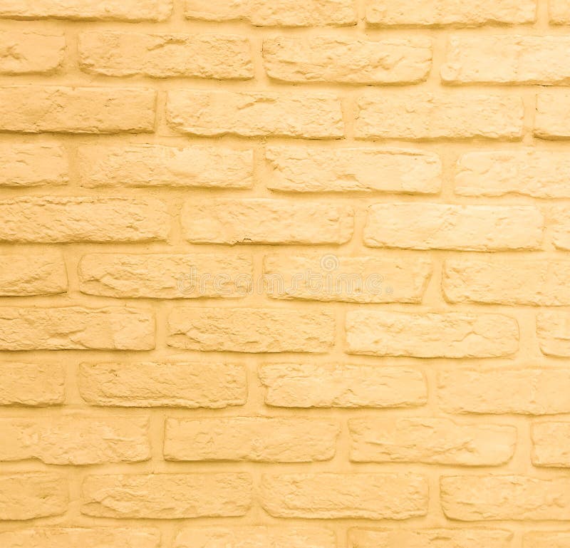 Yellow Brick Wall Made of Old Brick. Yellow Background with Texture ...